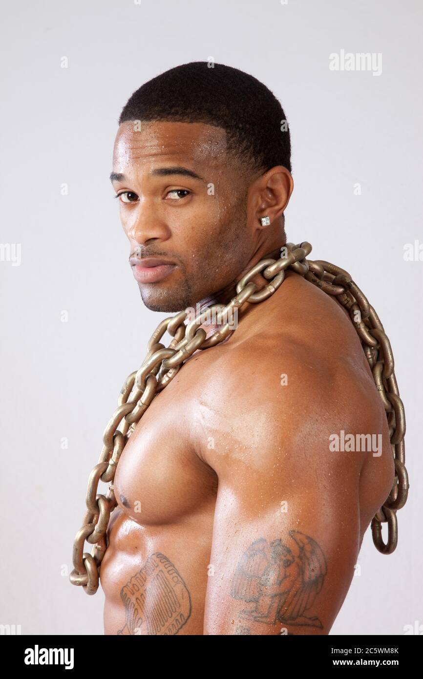 Fit black man with a chain Stock Photo - Alamy
