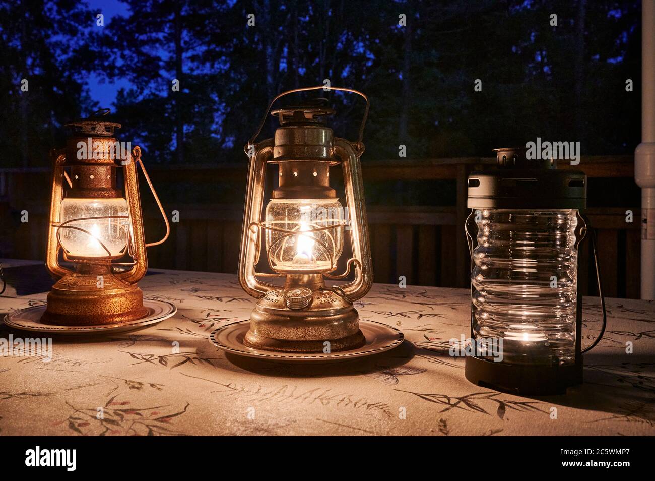 One summer evening, old kerosene lamps are used to illuminate and ...