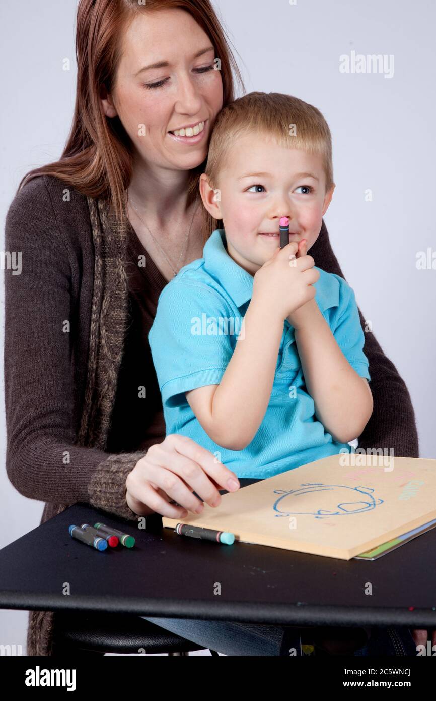 Beautiful family drawing together hi-res stock photography and images ...