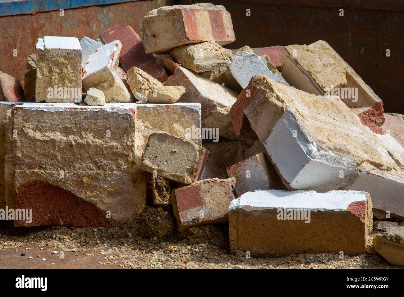 a pile of bricks and rubble that has been fly tipped from a broken ...