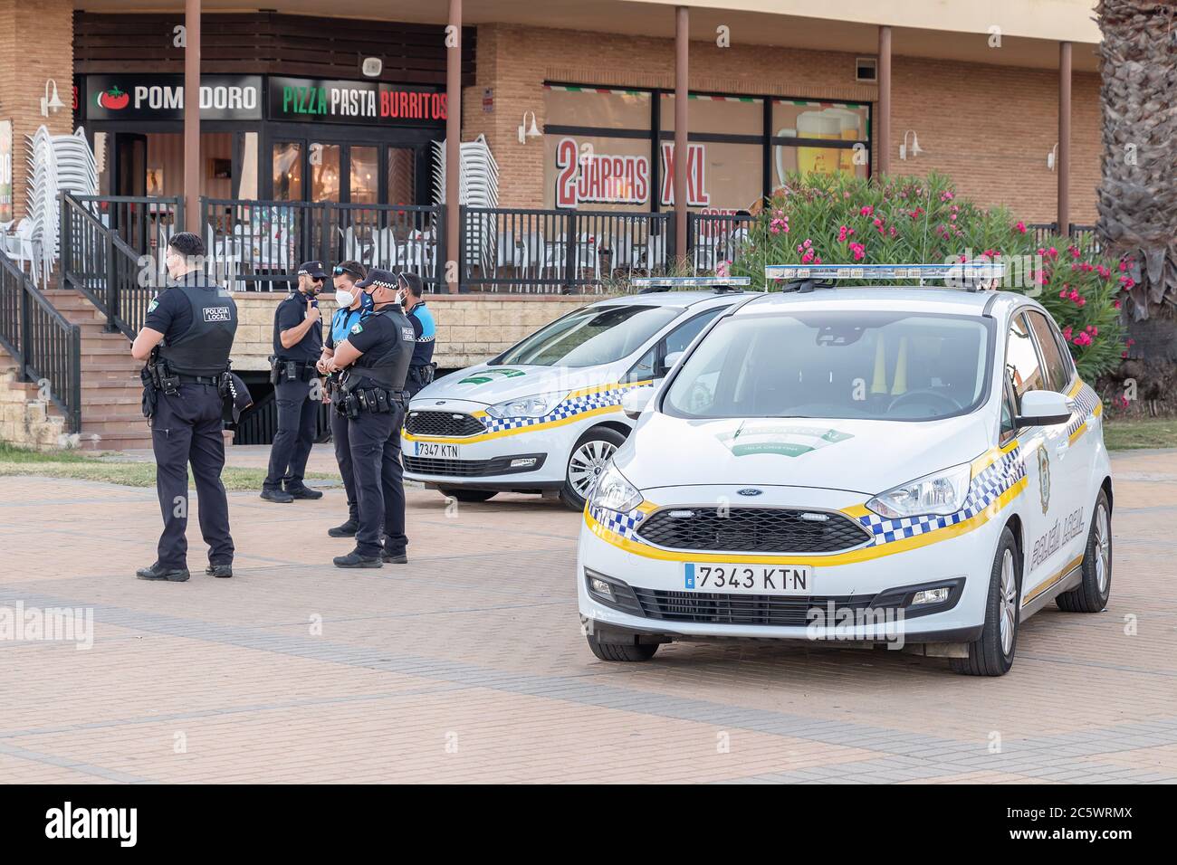 Huelva, Spain - July 4, 2020: Spanish police with "Local Police" logo ...