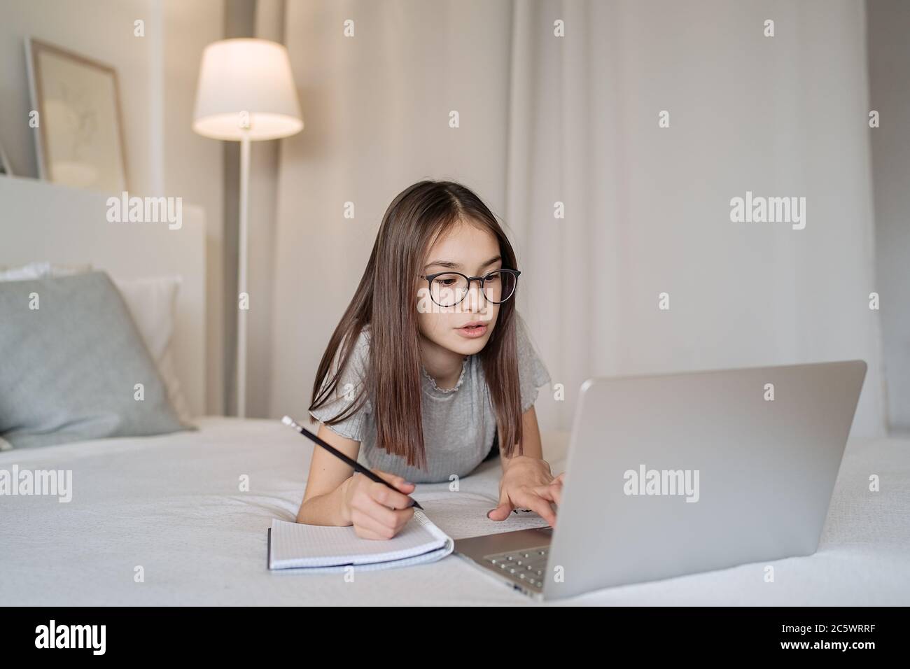 Teen laptop homework hi-res stock photography and images - Alamy