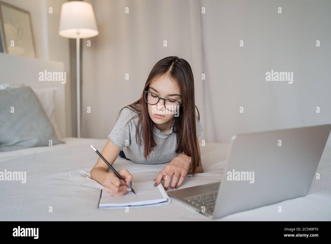 Teen laptop homework hi-res stock photography and images - Alamy