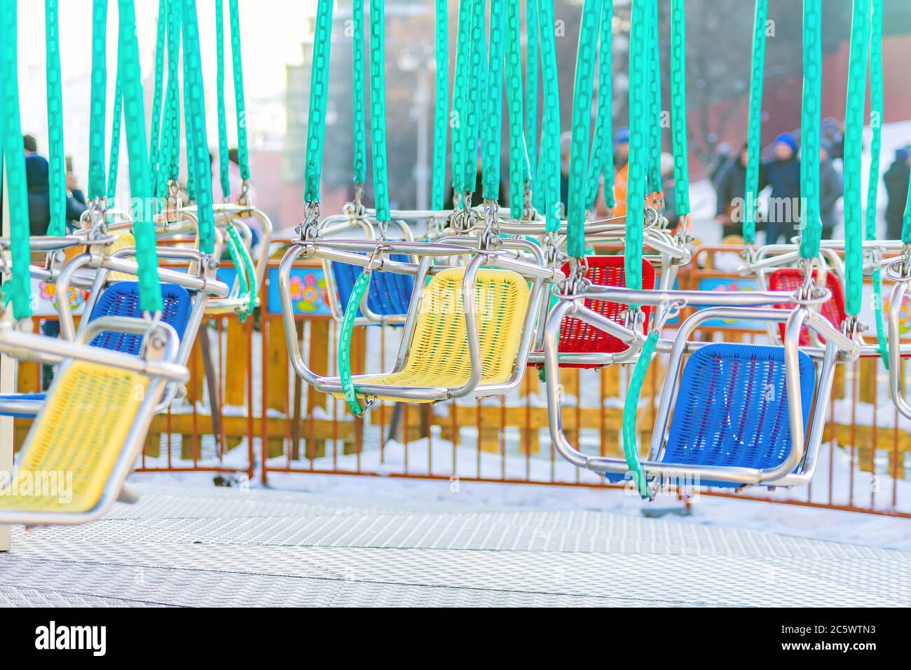 empty seats of childrens carousel in a cloudy day Stock Photo - Alamy