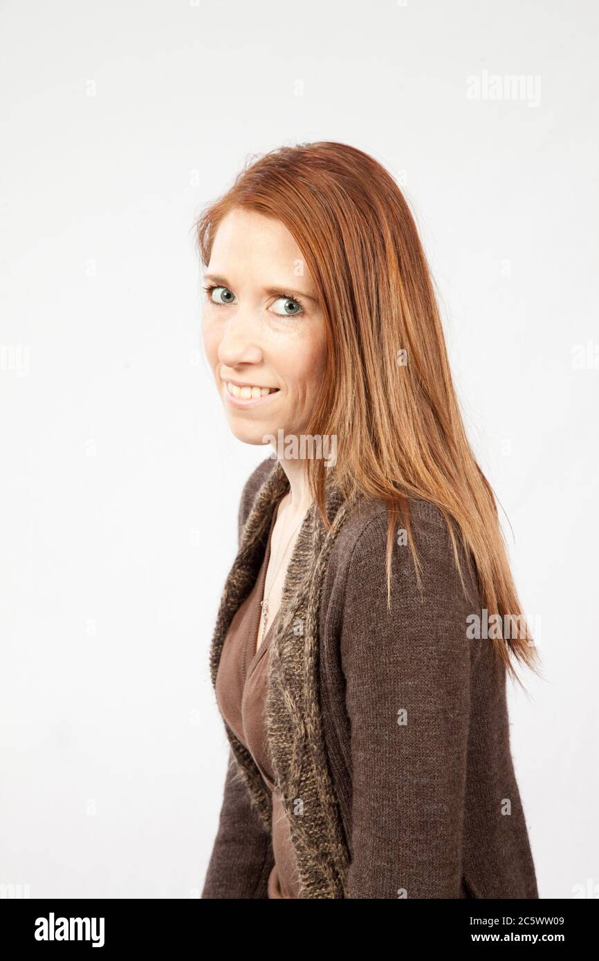 Pretty woman looking happy Stock Photo - Alamy