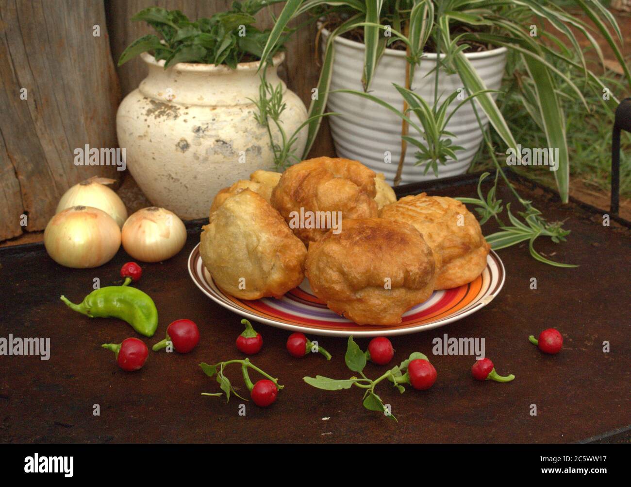 Vetkoek - traditional South African dish (fried bread Stock Photo - Alamy