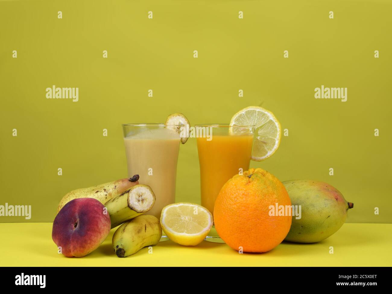 yellow smoothie - healthy fruity drink Stock Photo - Alamy