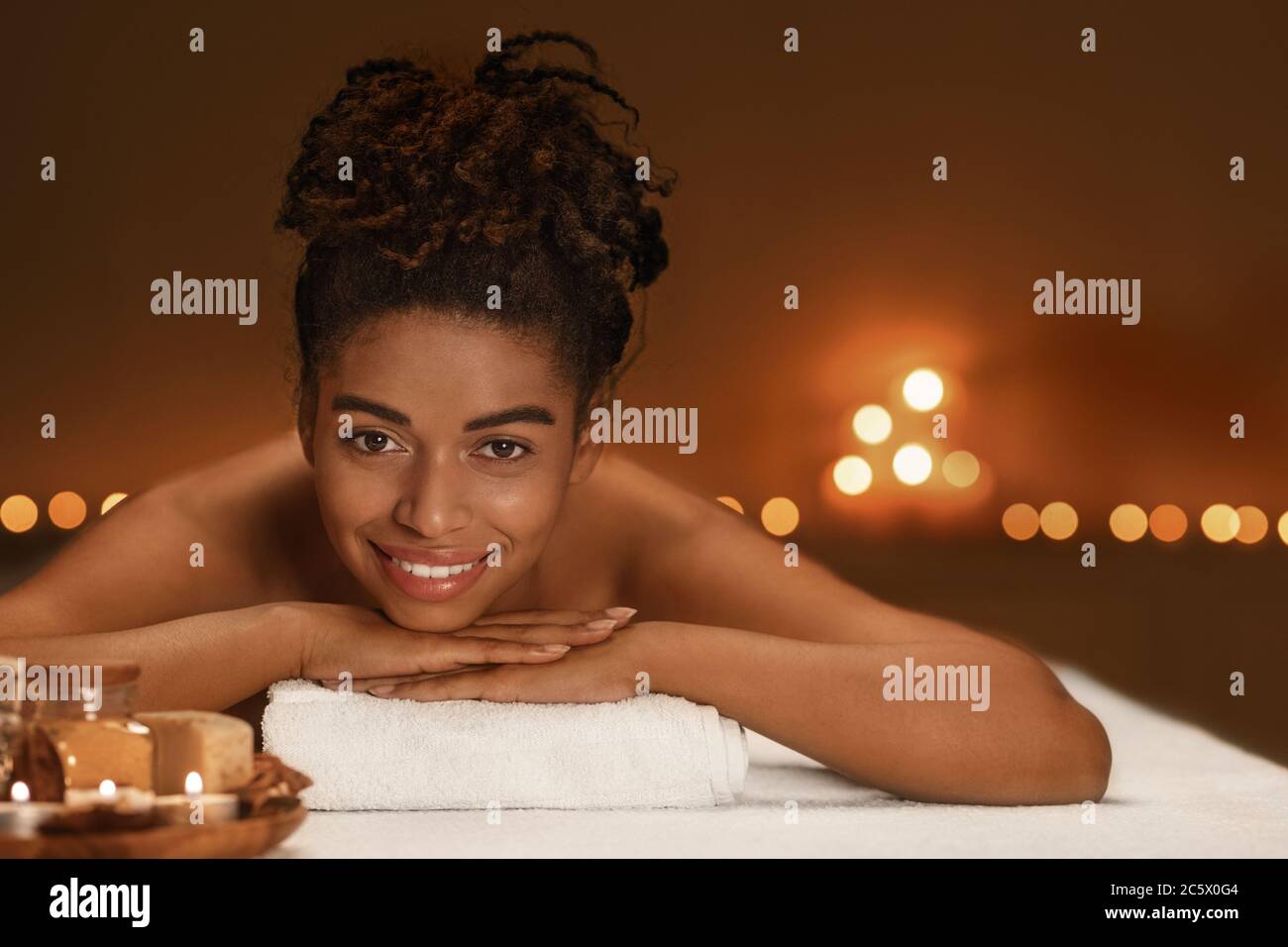 Portrait of cheerful african woman enjoying spa Stock Photo - Alamy