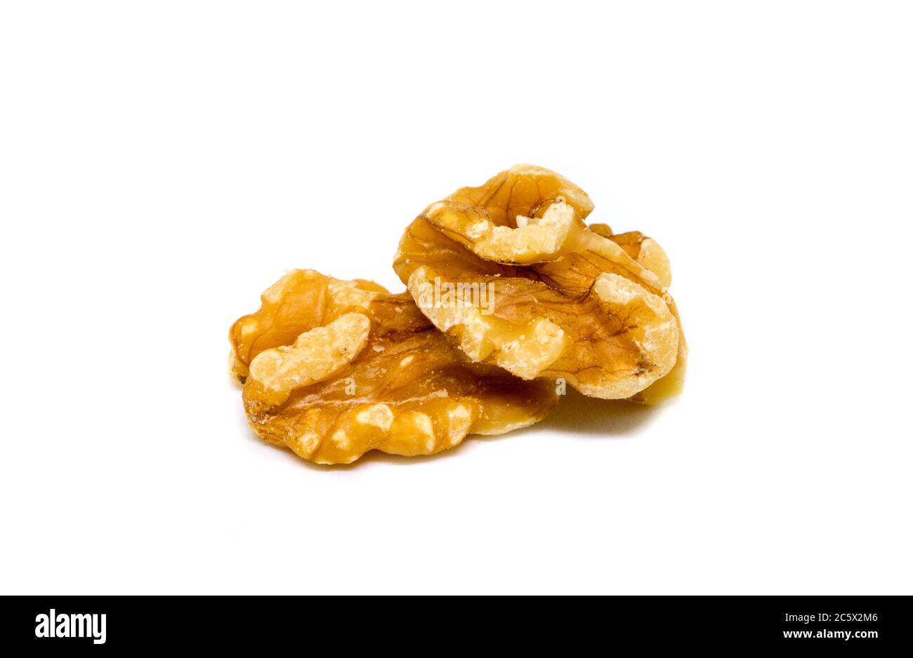 Natural walnut on white background. Cracked and cleaned nut kernel ...