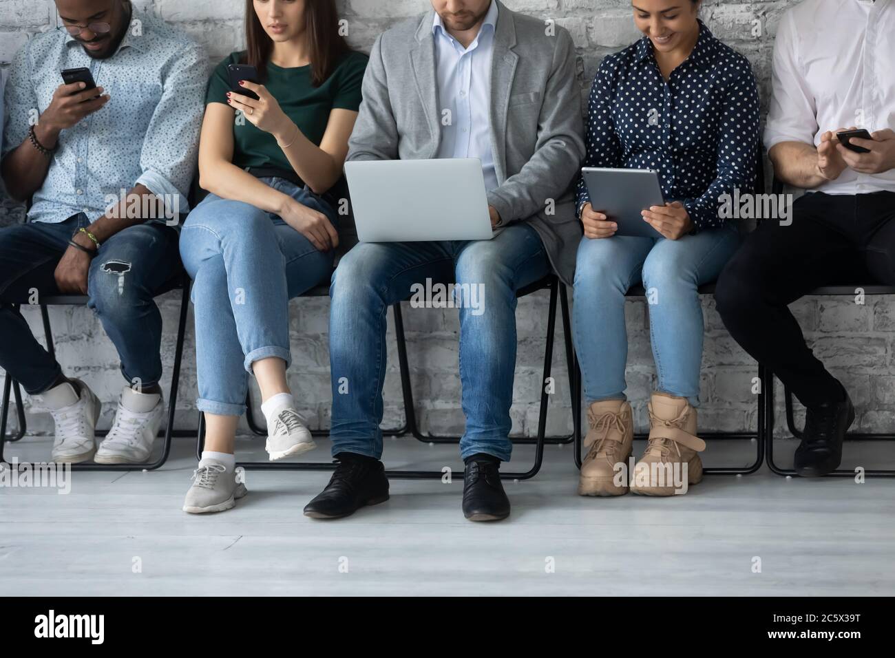 Diverse group people using electronic hi-res stock photography and ...