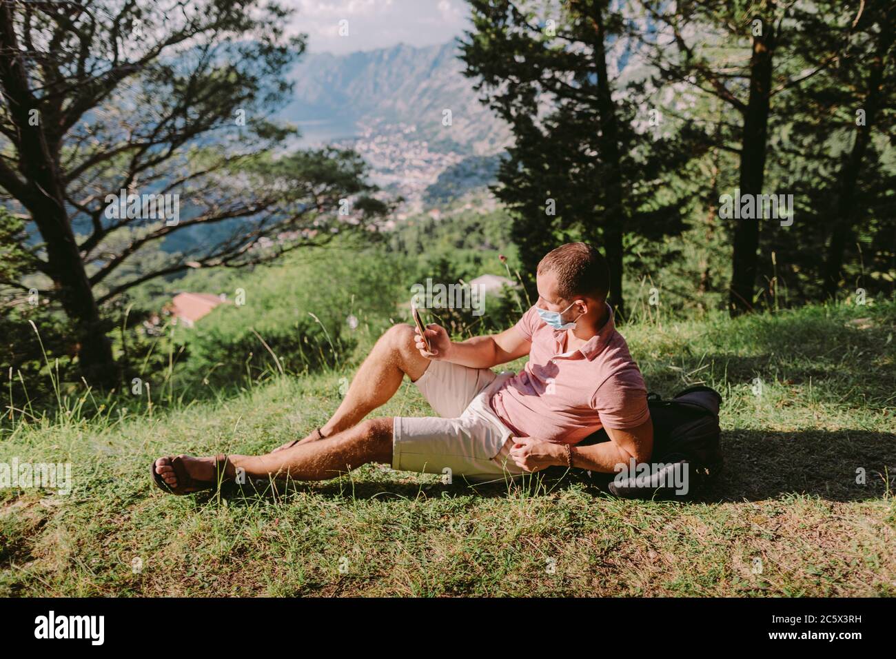 man travel wearing protective face mask in mountains Stock Photo - Alamy