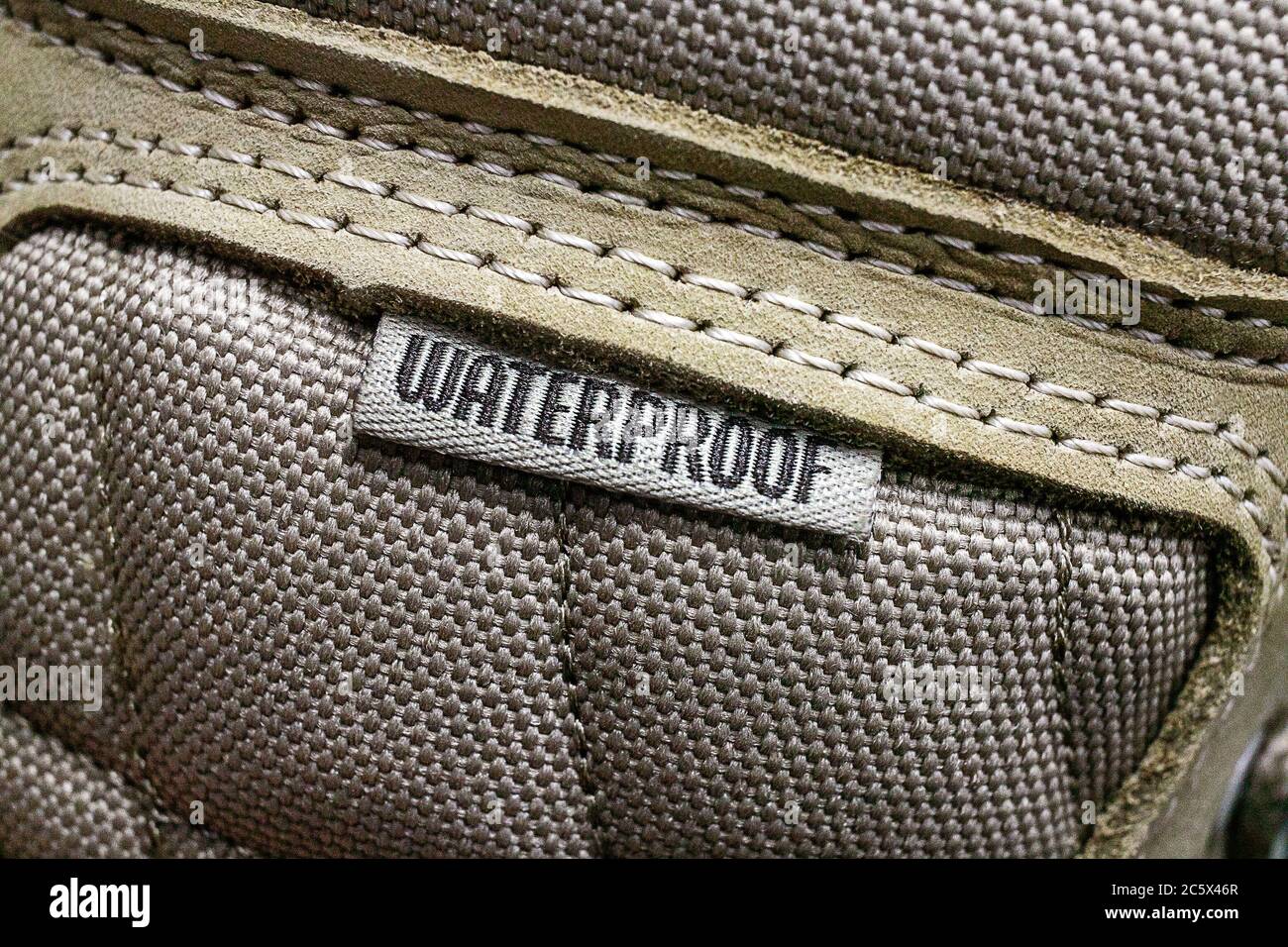 Close-up of waterproof label view on leather shoes or clothes Stock ...