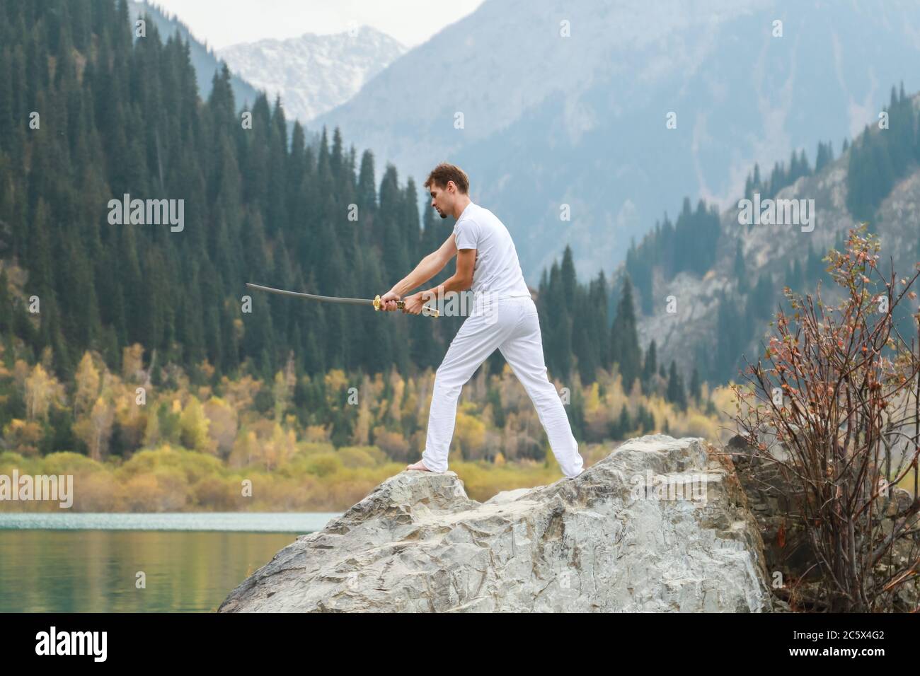 A man with a sword goes on the attack on the enemy. The emotional ...