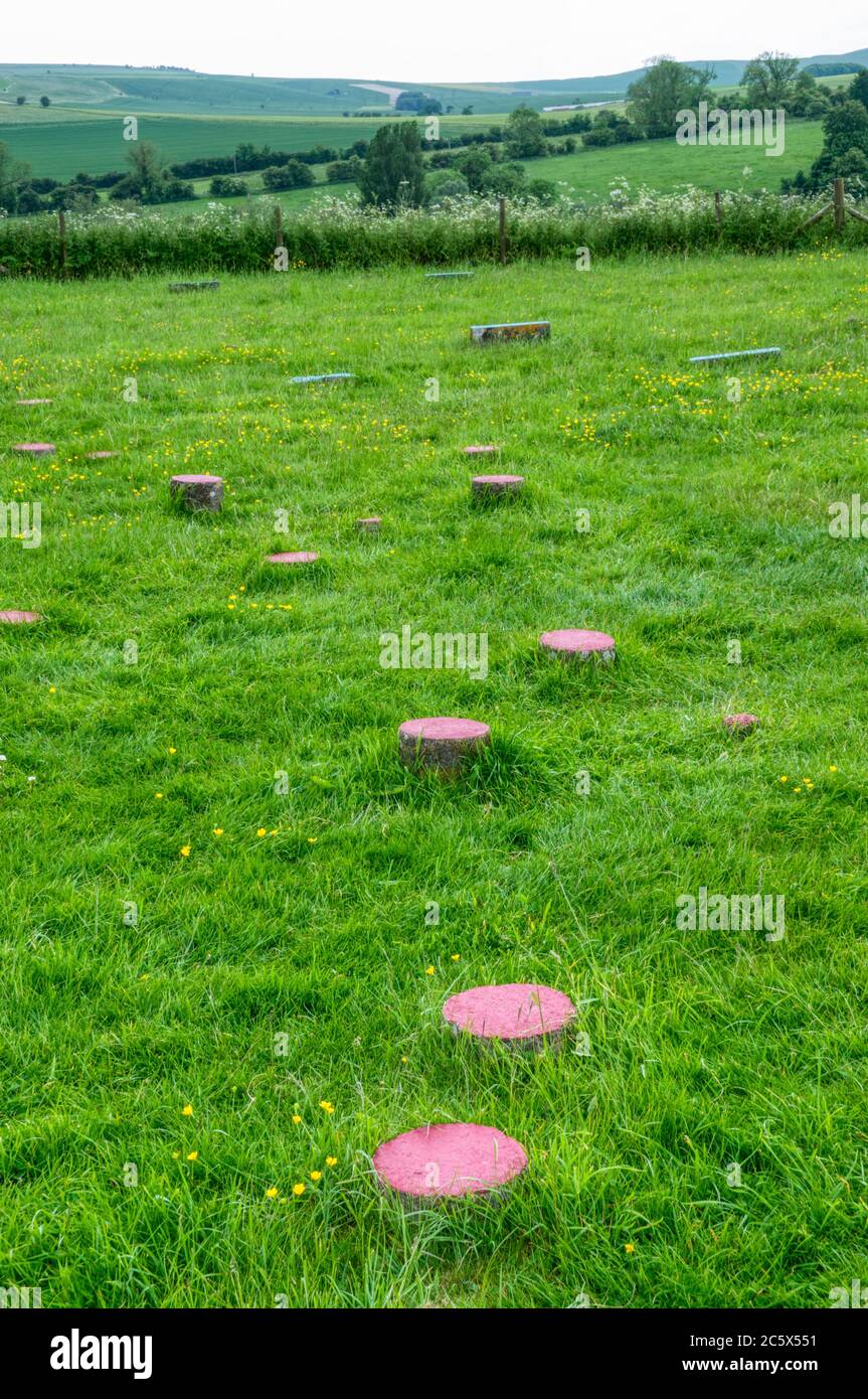 Concrete marker posts show position of original stone & wooden posts at ...