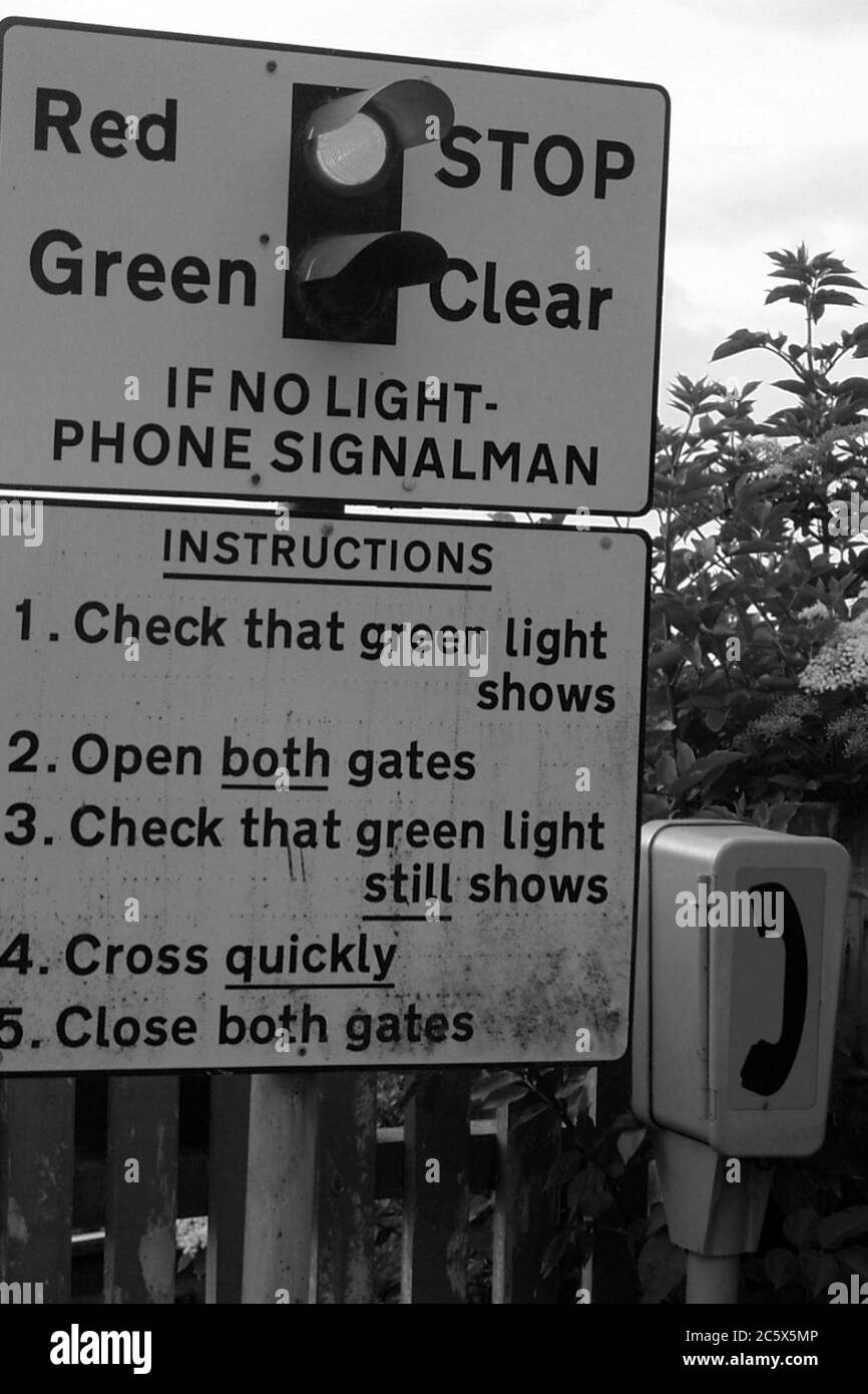 railway safety signs, train track Stock Photo - Alamy