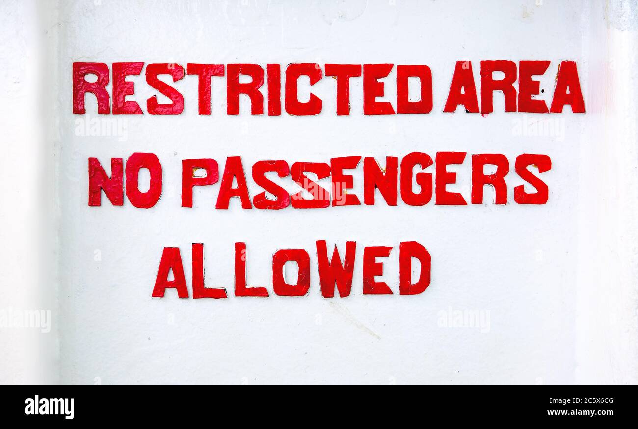 Red sign Restricted area No passenger allowed on white background ...