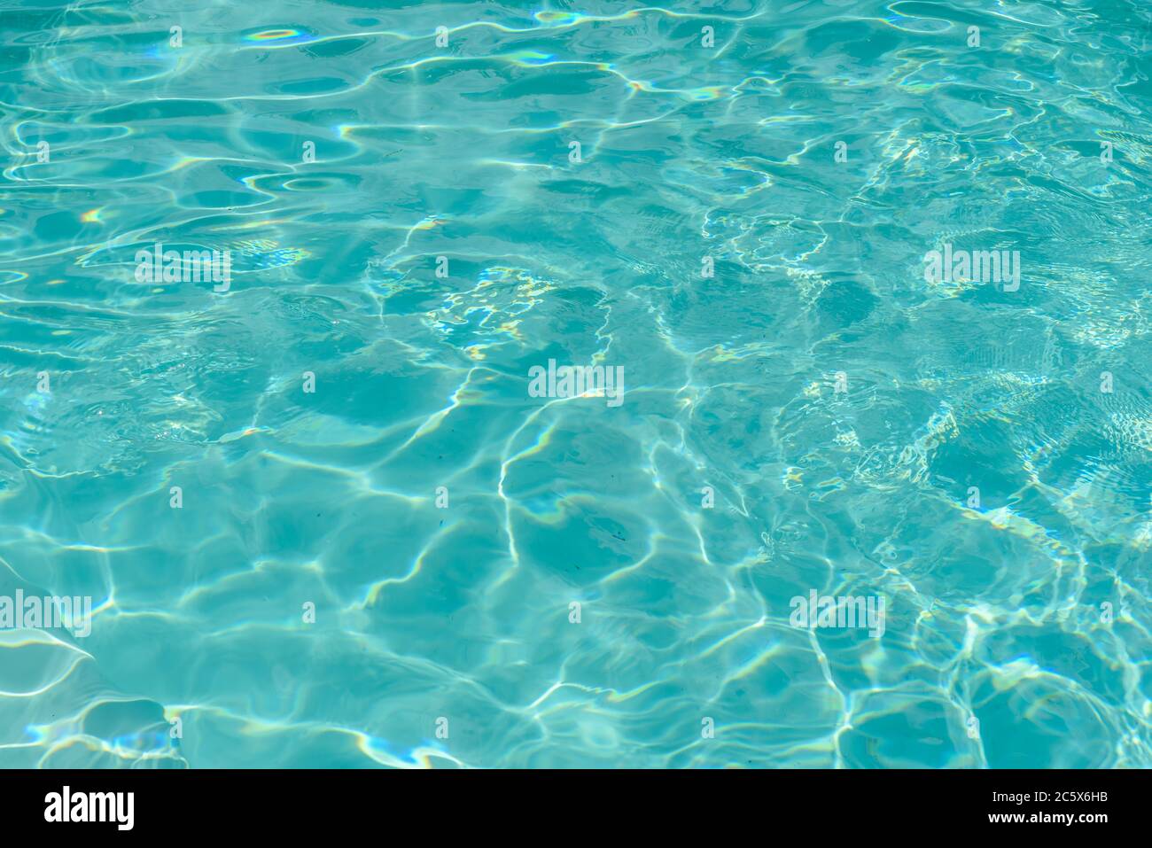 Private pool with clear water in summertime Stock Photo - Alamy