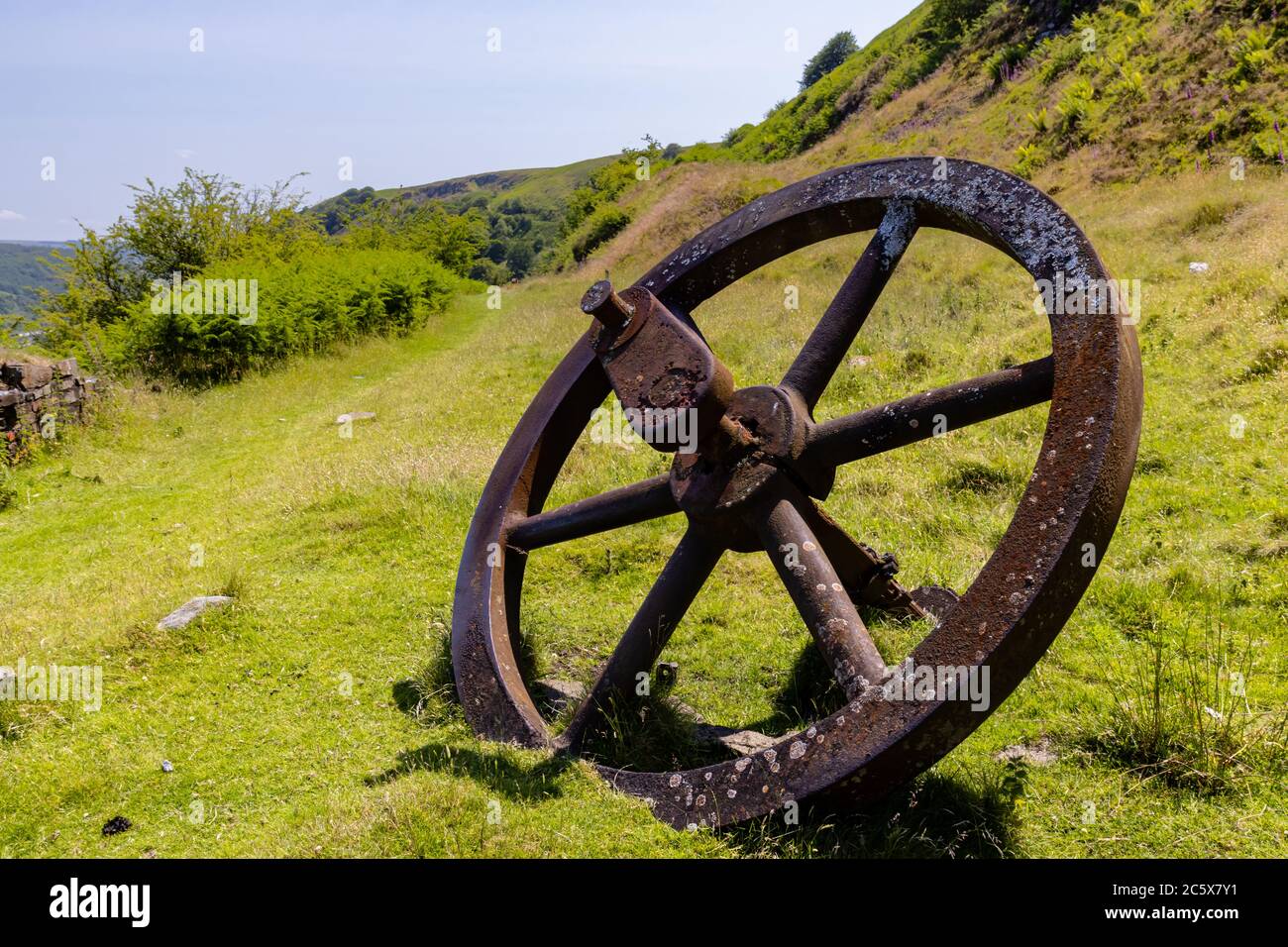 Huge, rusting abandoned flywheel from a Victorian era lifting engine ...