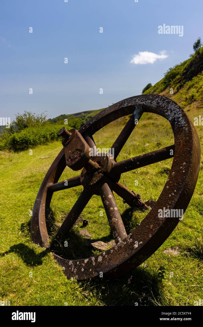 Huge, rusting abandoned flywheel from a Victorian era lifting engine ...