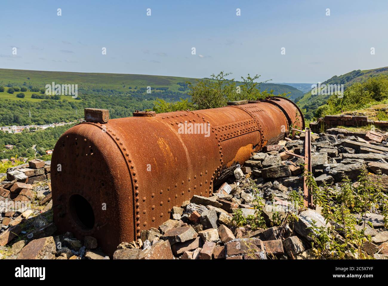 Rusting remains of an old, Victorian era boiler and lifting engine ...