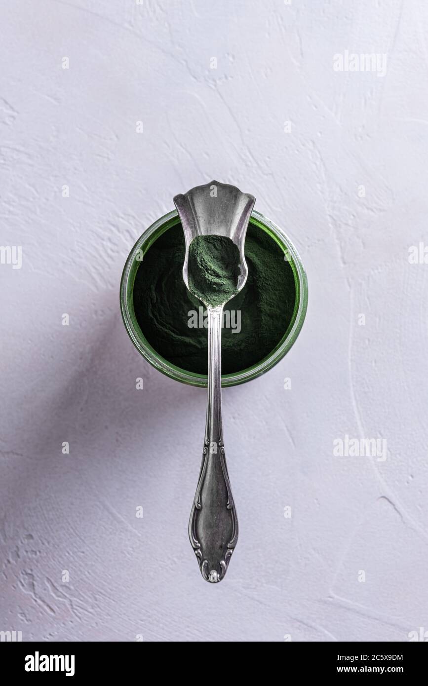 Spoon chlorella powder on hi-res stock photography and images - Alamy