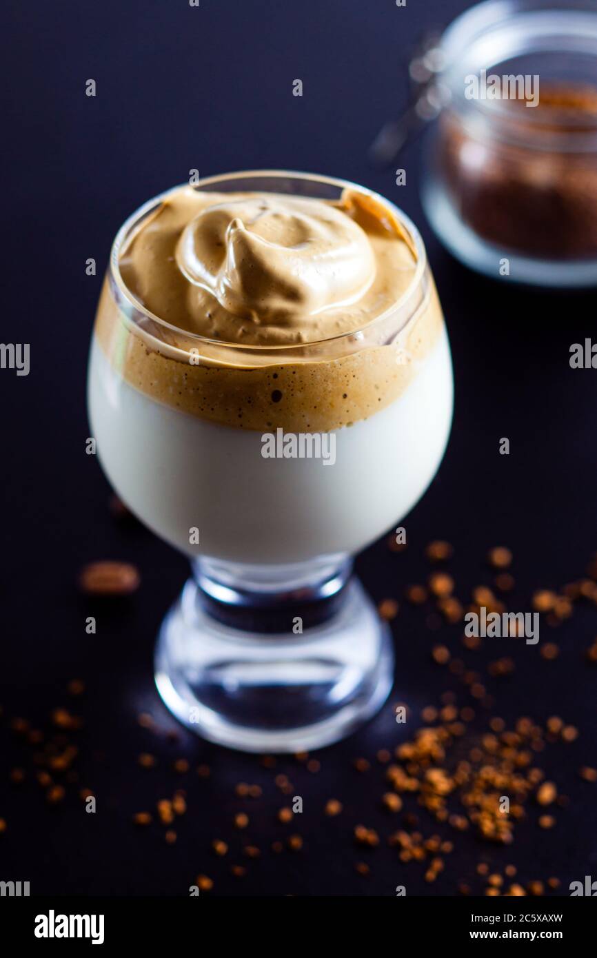 Dalgona coffee - whipped instant coffee mousse in the glass Stock Photo ...