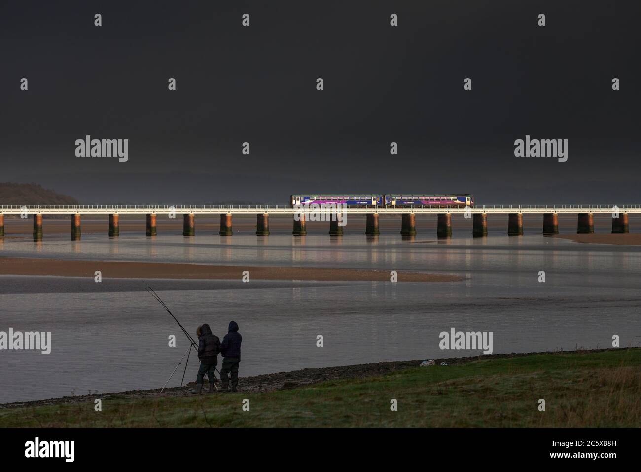 2 Northern rail class 153 sprinter trains crosses Arnside viaduct on ...