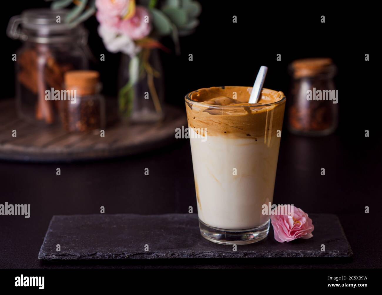 Fluffy instant coffee with cold milk in glass cup Stock Photo - Alamy