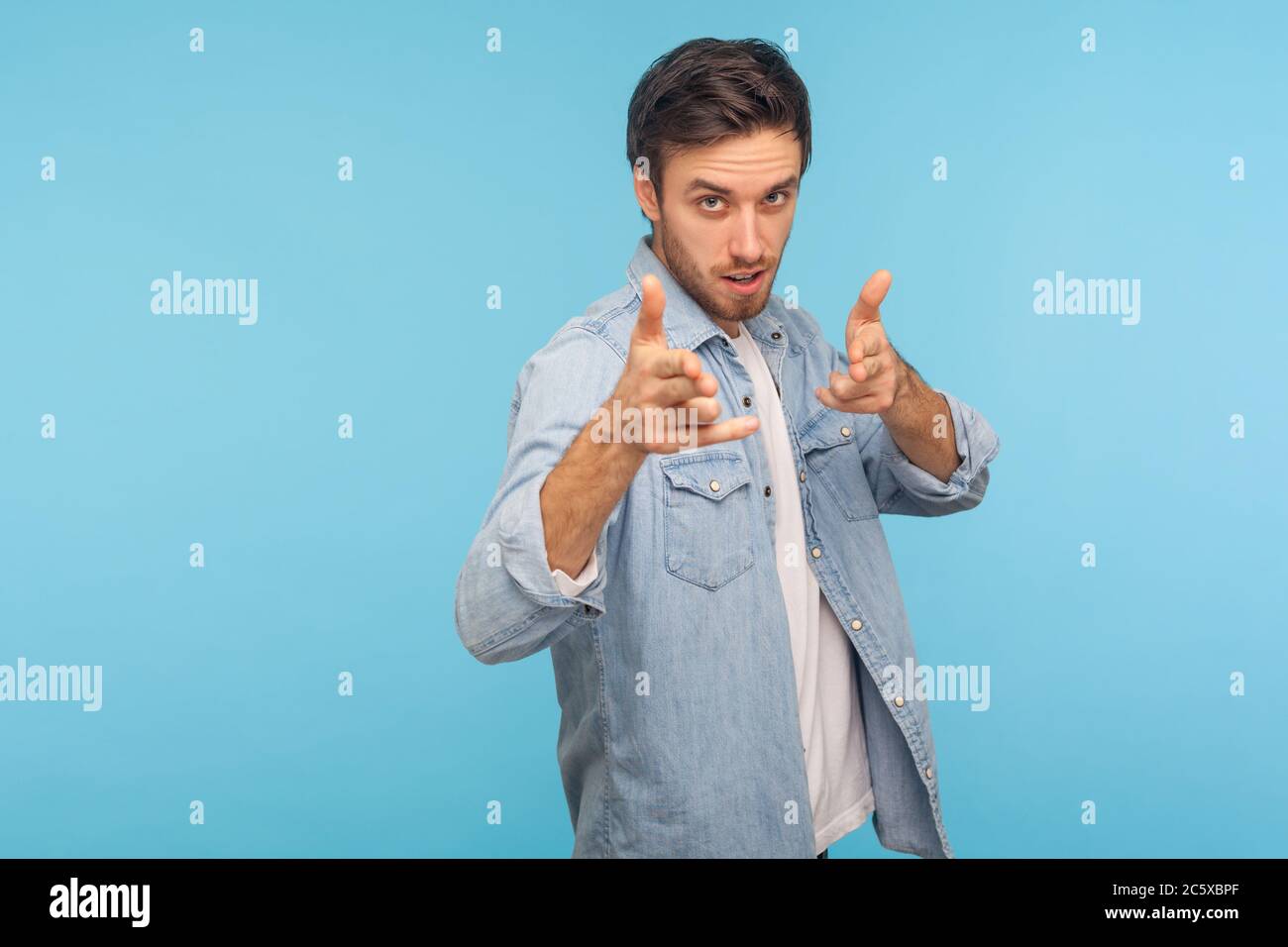 Man making finger gun gesture hi-res stock photography and images - Alamy