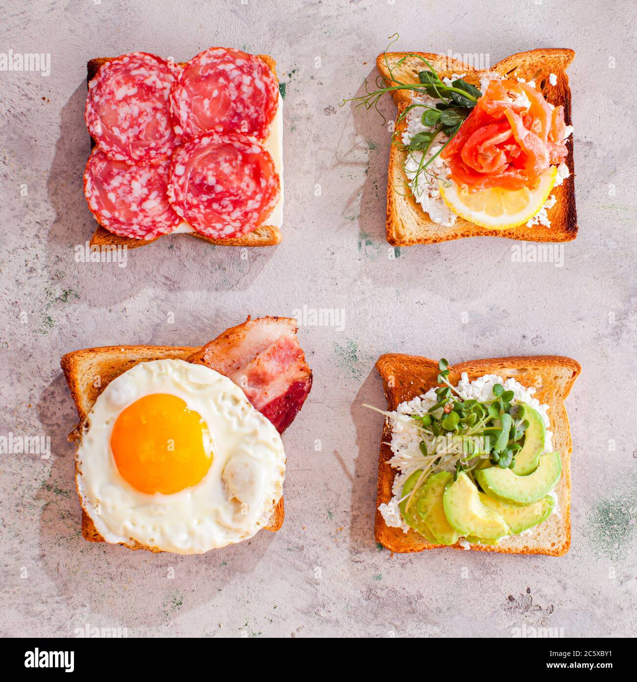 Top view set of open sandviches with wide range of contains Stock Photo ...