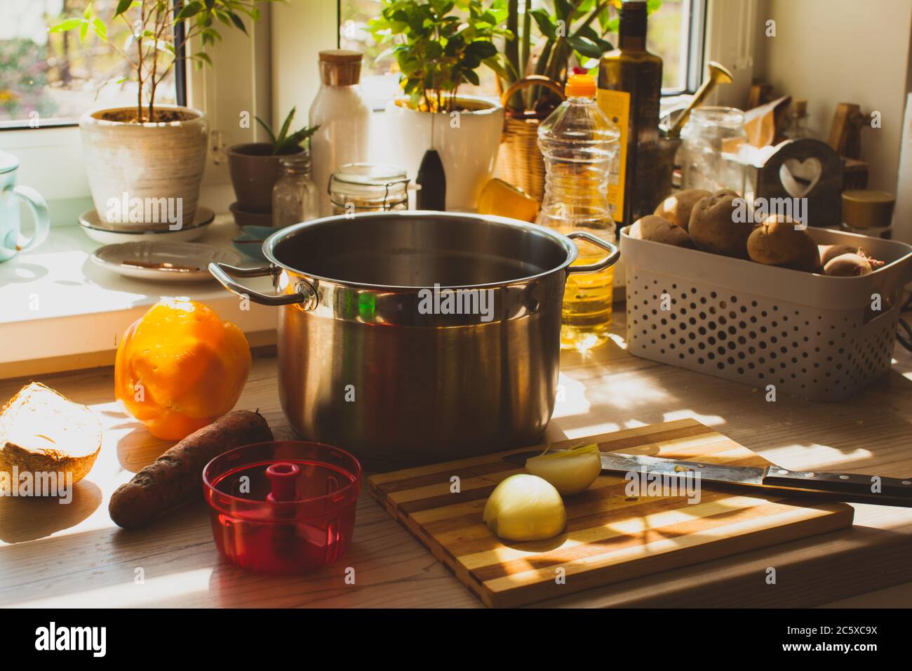 Still life kitchen with large pan and groceries Stock Photo - Alamy