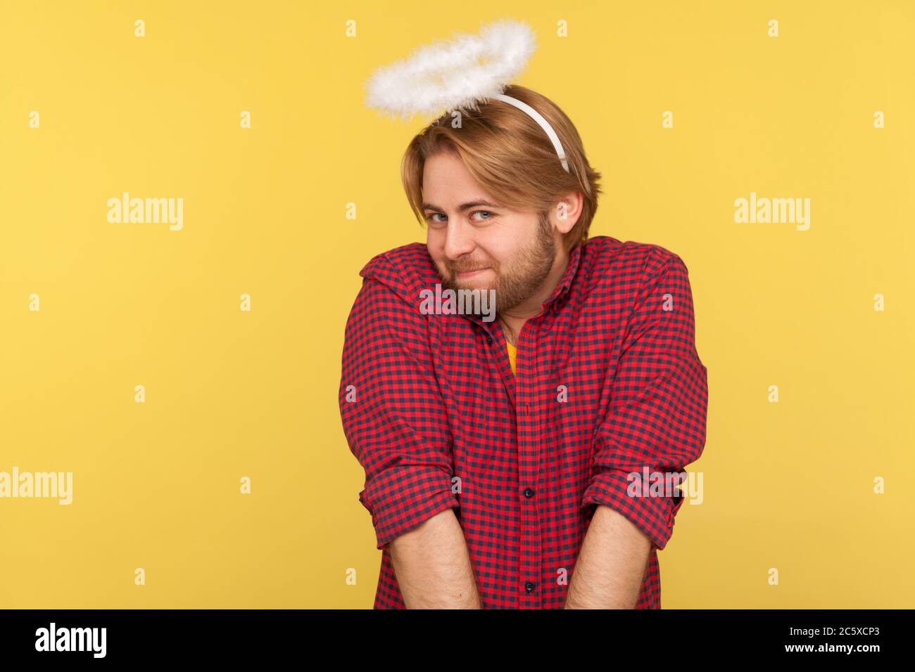 Modest expression hi-res stock photography and images - Alamy