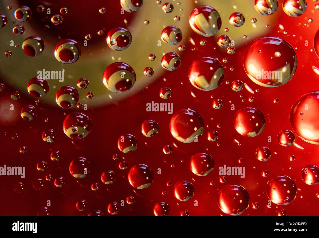 Abstract red and gold background with circular water drops Stock Photo ...