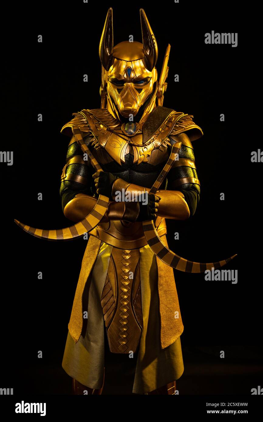 a male actor in a suit of an Egyptian mythology character, the golden ...