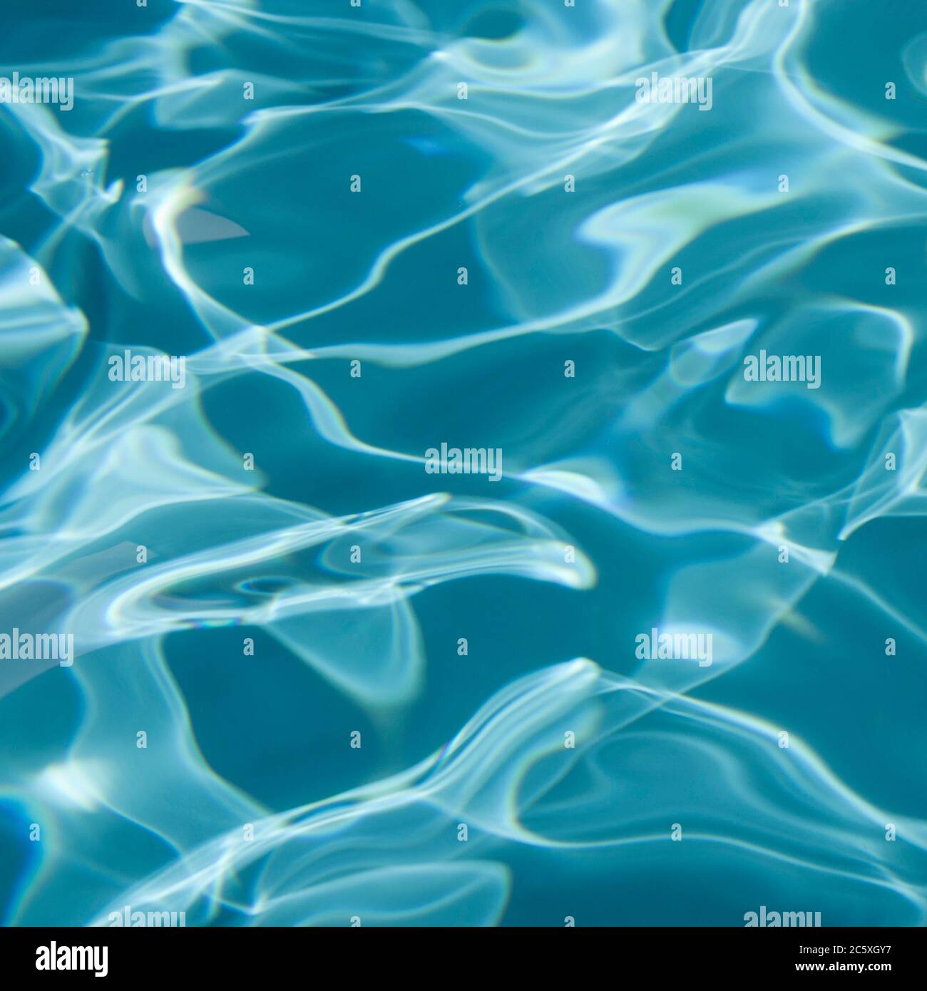 Reflections / ripples in pool water Stock Photo - Alamy