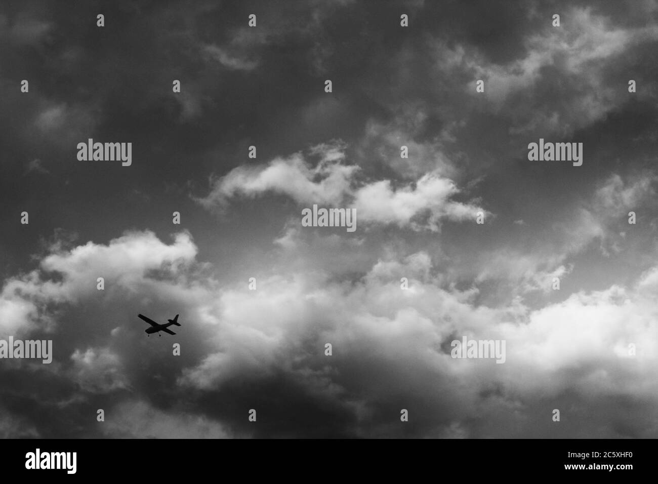 Flying plane contrast hi-res stock photography and images - Alamy