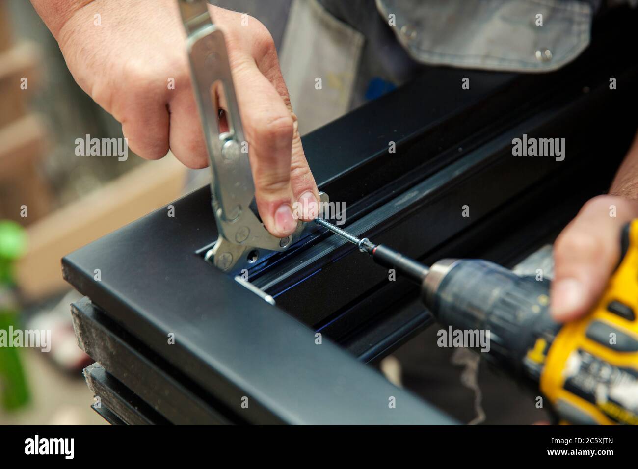 Hand placing tool hi-res stock photography and images - Alamy