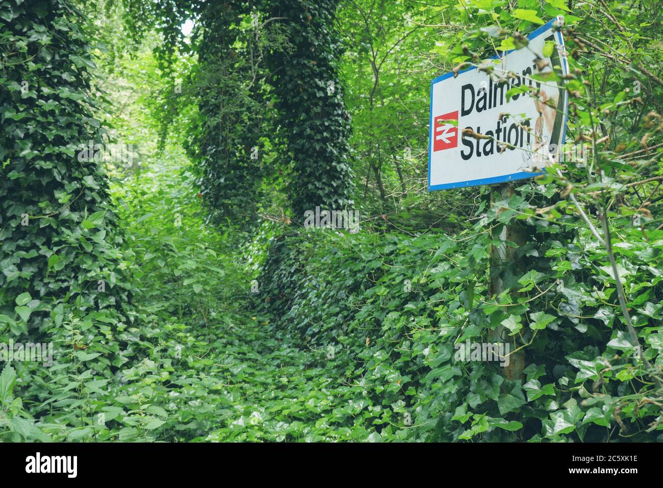 Dalmeny station sign in the woods, village of Luss Scotland Stock Photo ...
