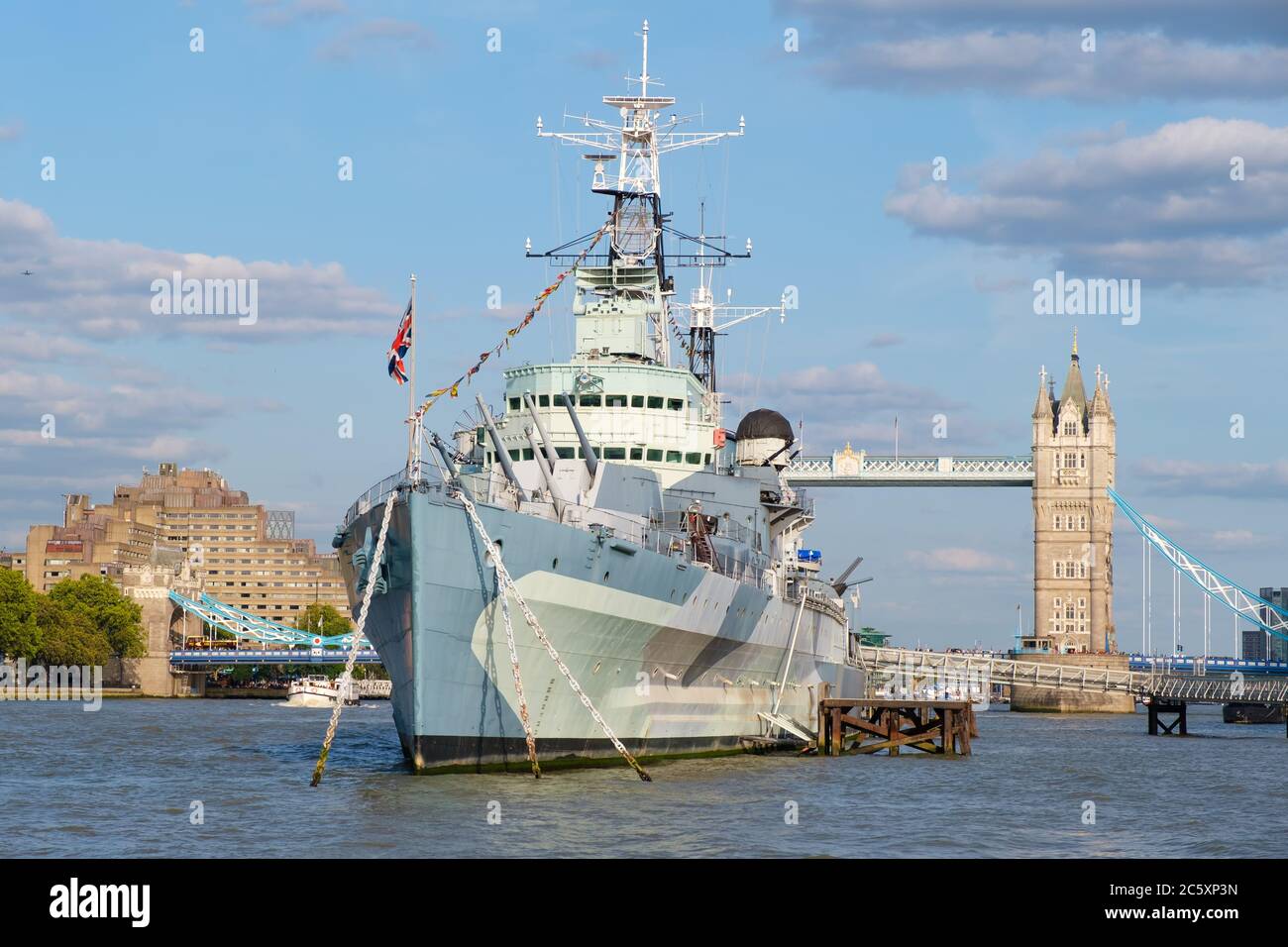 The HMS Belfast warship docked near Tower Bridge on the river Thames in London Stock Photo - Alamy