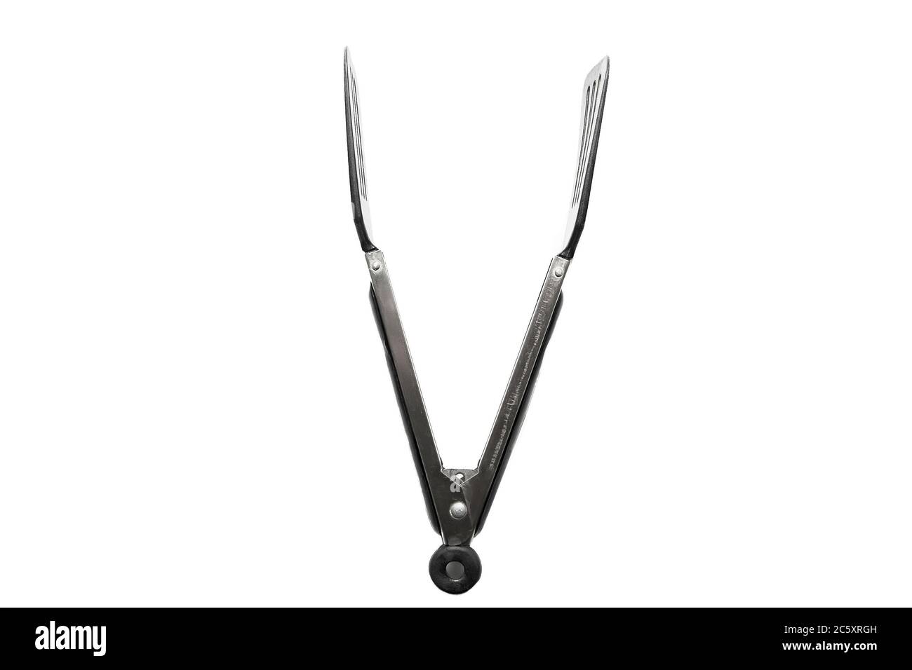 Culinary tongs hi-res stock photography and images - Alamy