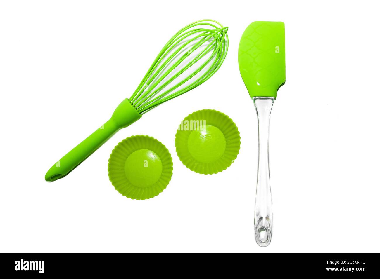 Set of green silicone cooking utensils isolated on white background ...