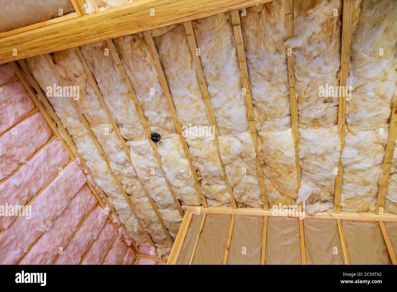 Thermal insulation layer under the attic roof with unfinished dwelling ...