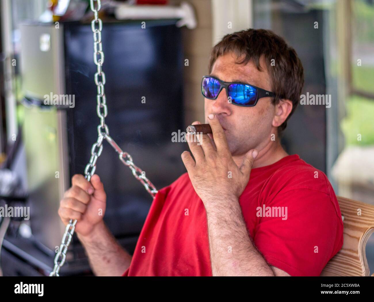 Porch swing hi-res stock photography and images - Alamy