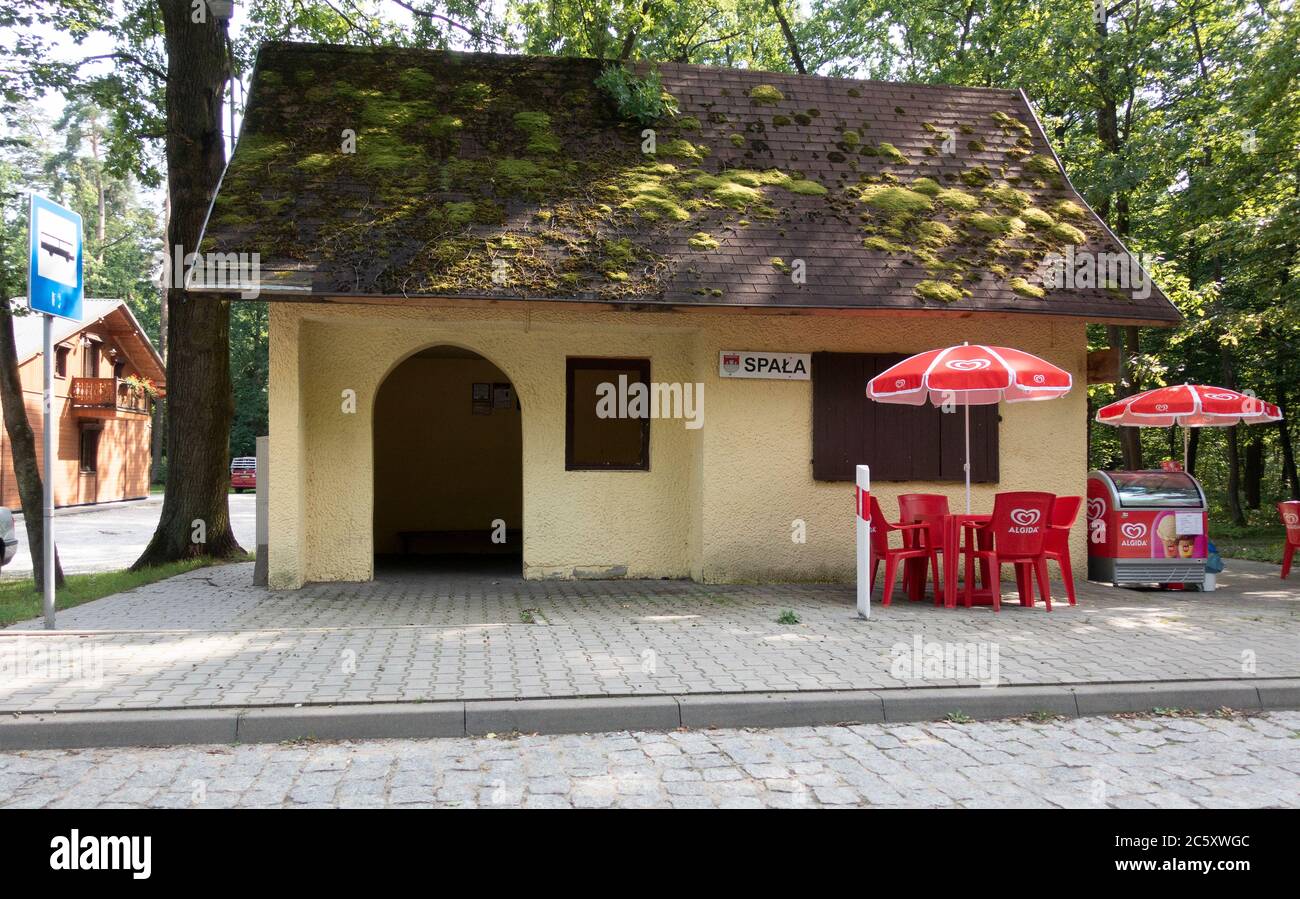 Polish rest stop with a mobile Algida ice cream shop with table and ...