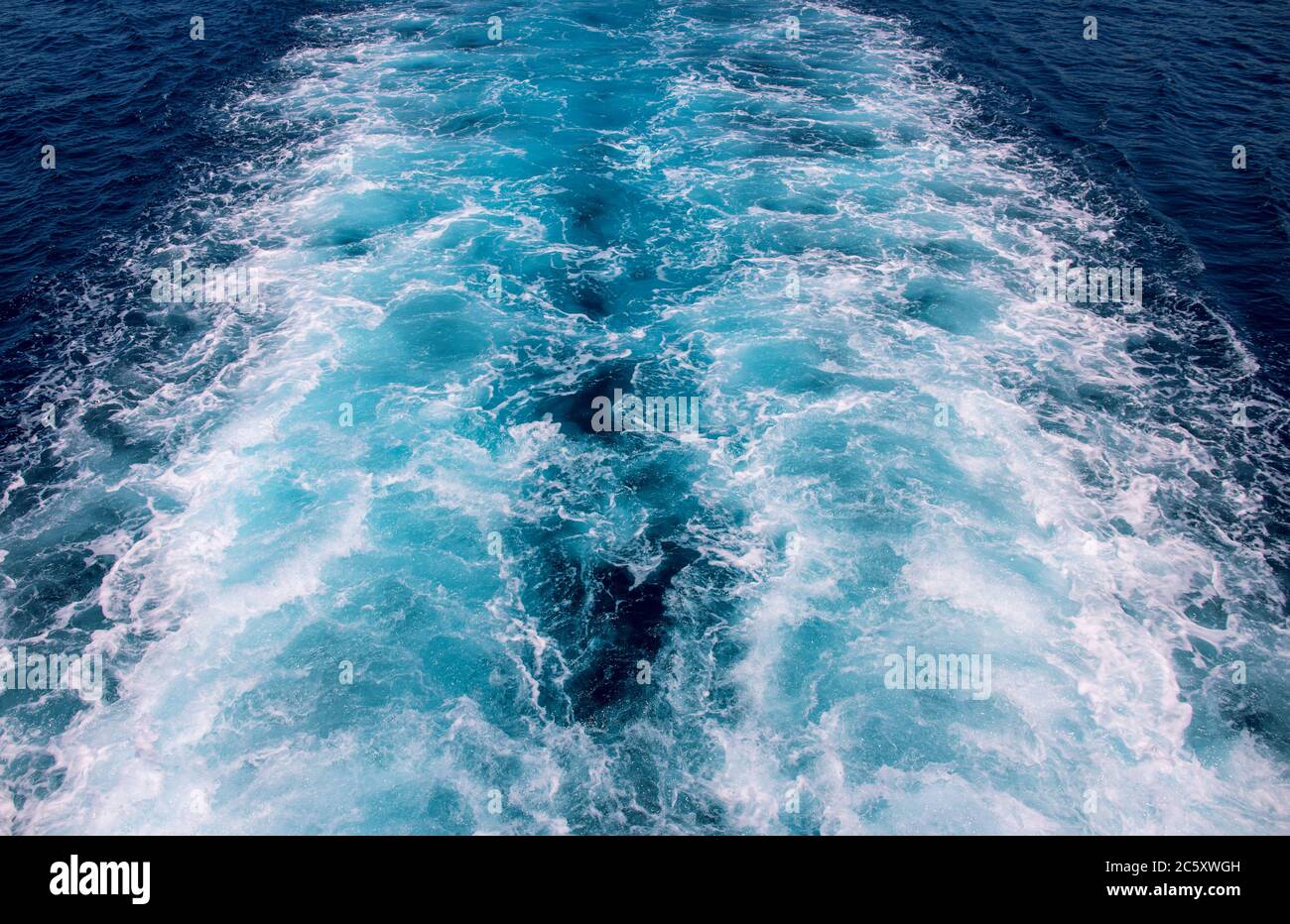 Speed boat trail on sea water photo. White foam on blue water. Ocean ...
