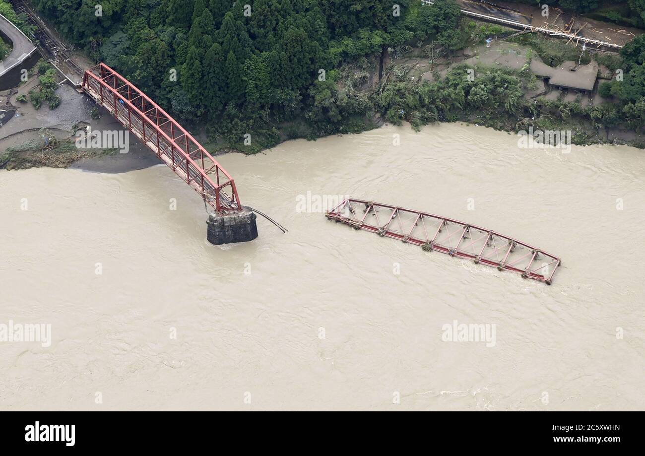 Photo taken from a Kyodo News helicopter shows a collapsed bridge over ...