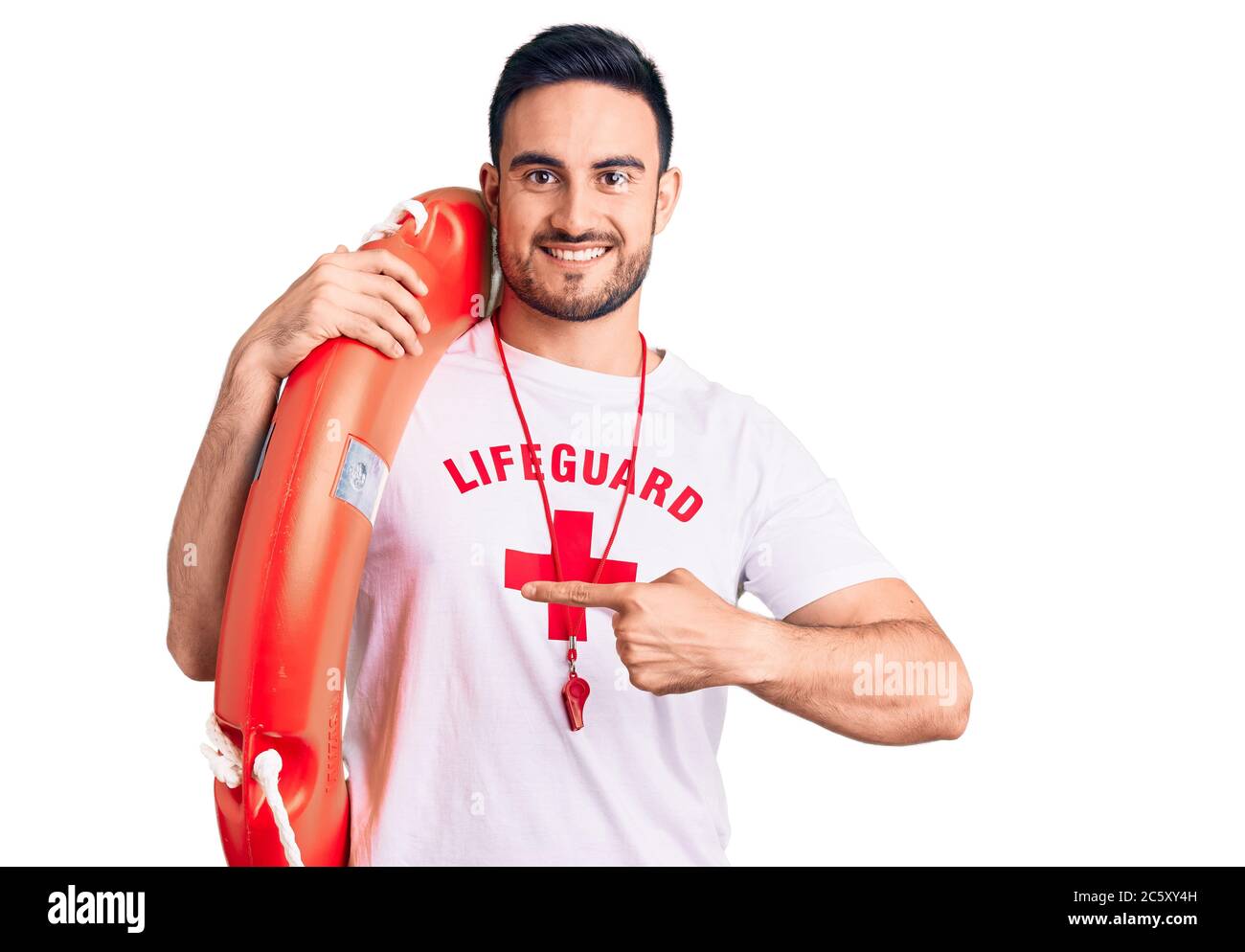 Young handsome man wearing lifeguard uniform holding float smiling ...