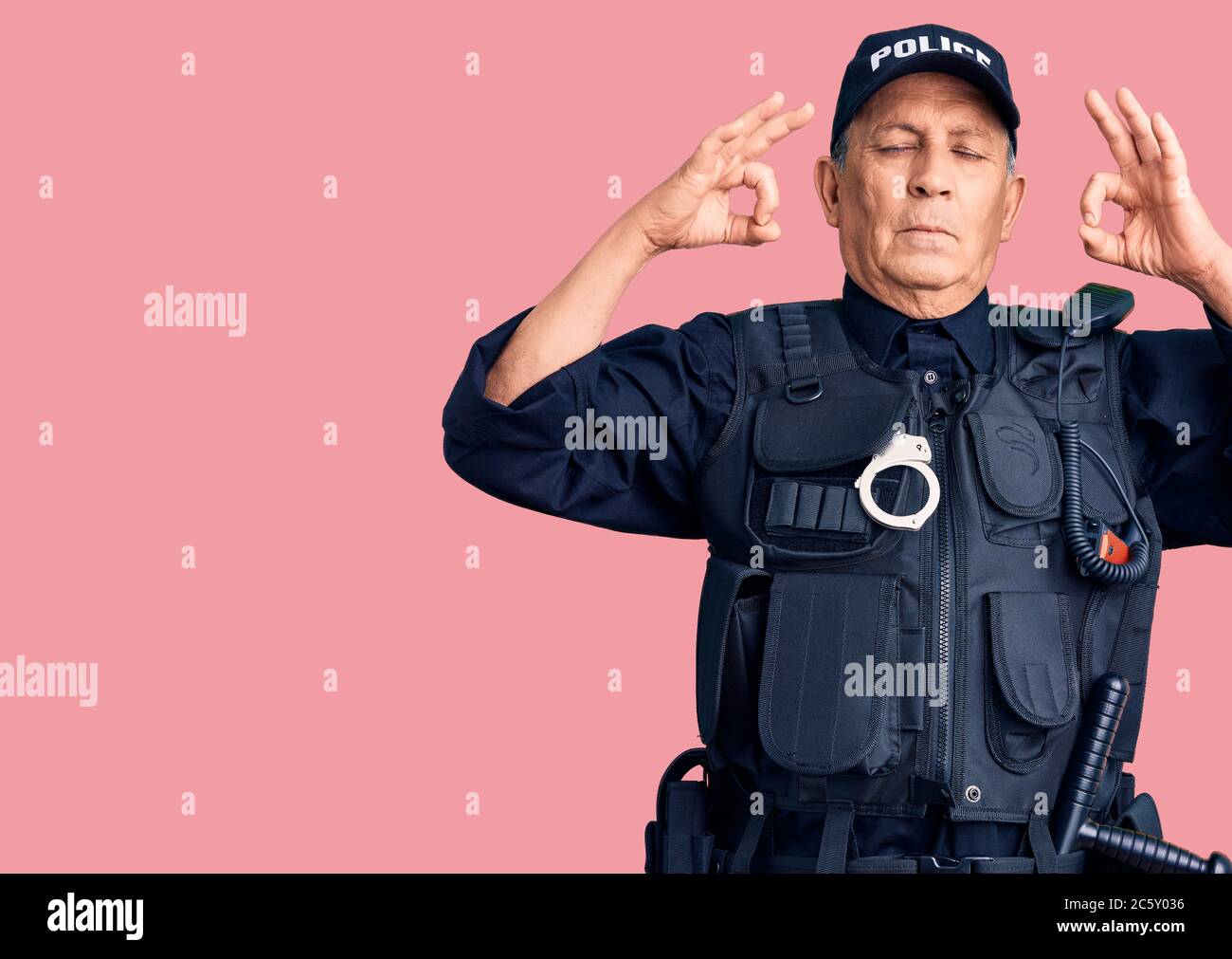 Senior handsome man wearing police uniform relax and smiling with eyes ...