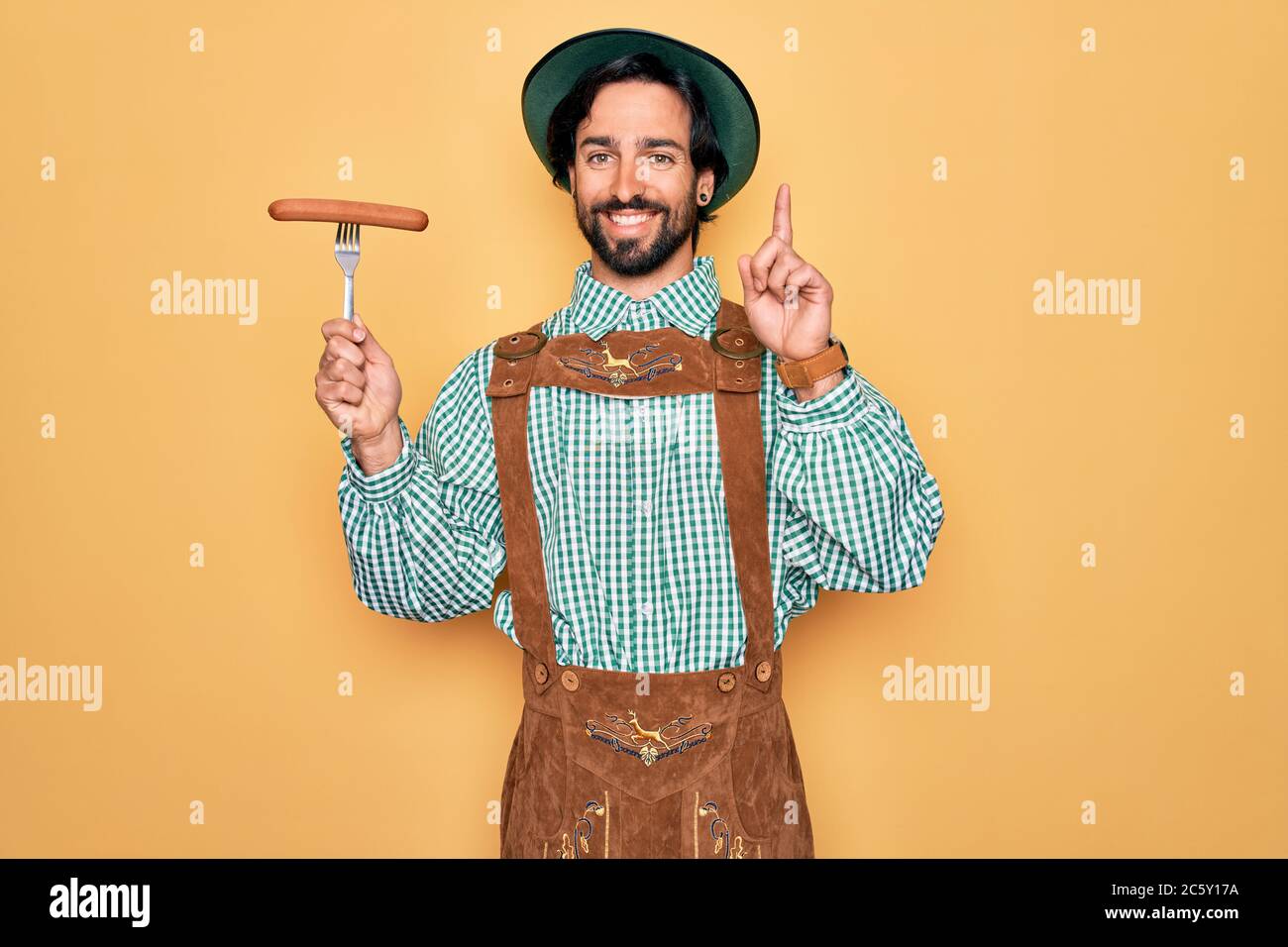 Young handsome man wearing tratidional german octoberfest custome ...