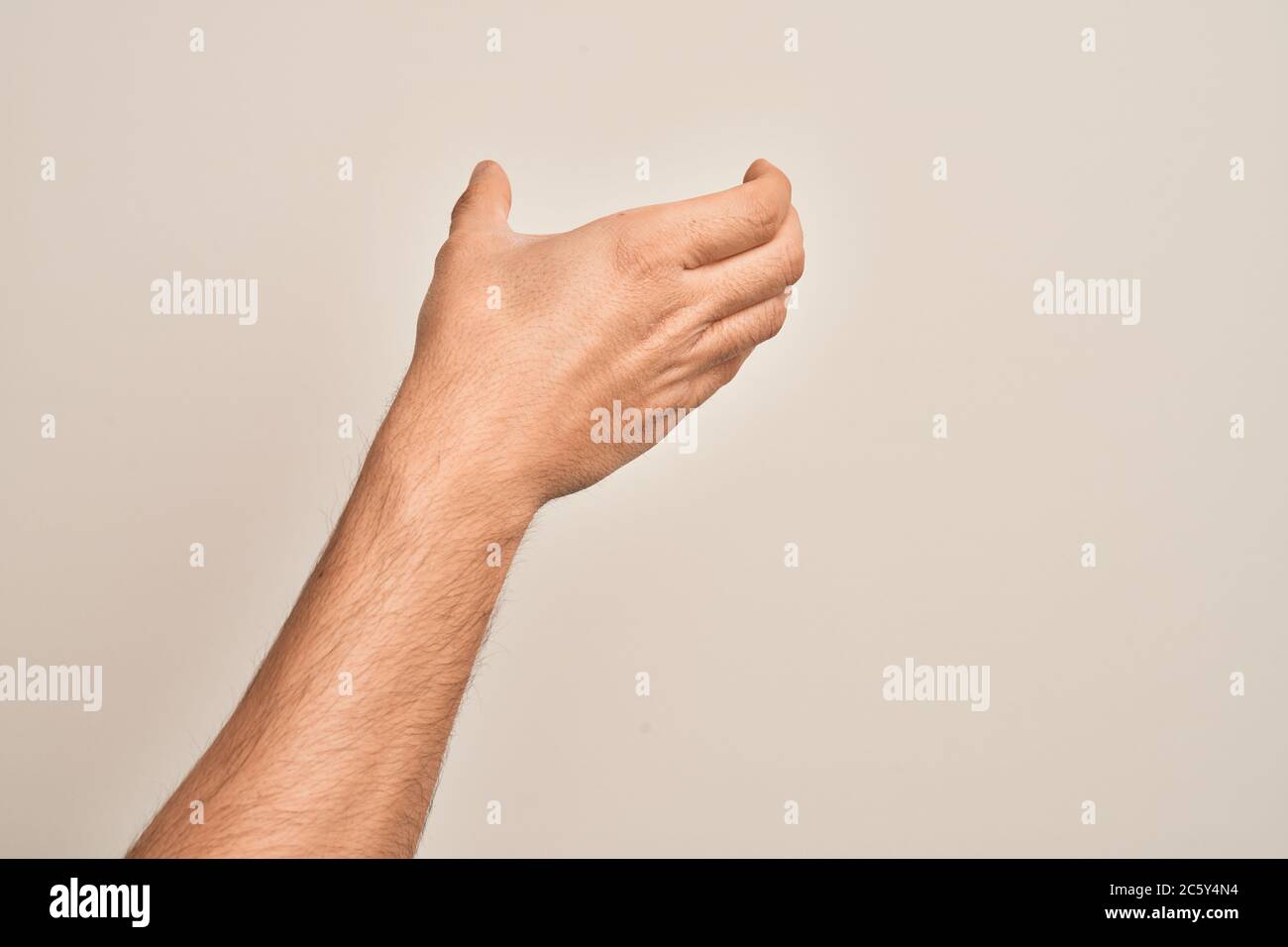 Hand of caucasian young man showing fingers over isolated white ...